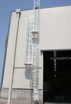 Hooped and safety vertical ladders